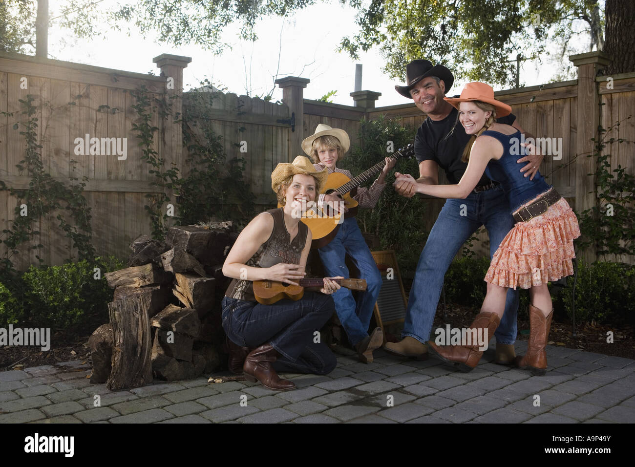 Family playing country music and dancing together Stock Photo - Alamy