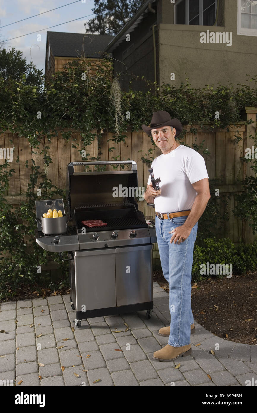 Grilling corn person hi-res stock photography and images - Alamy