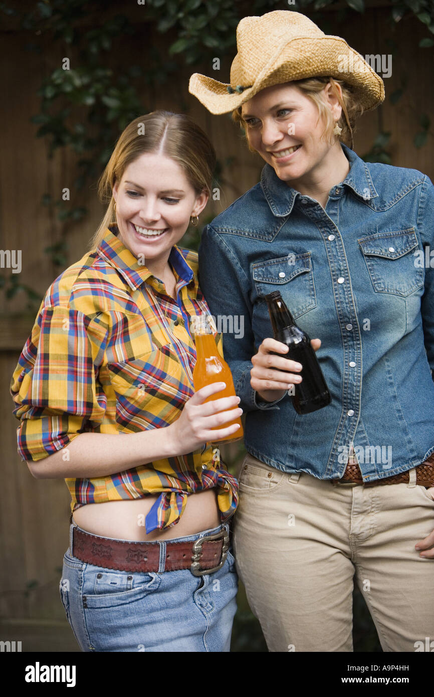 Country mother and daughter standing together Stock Photo - Alamy