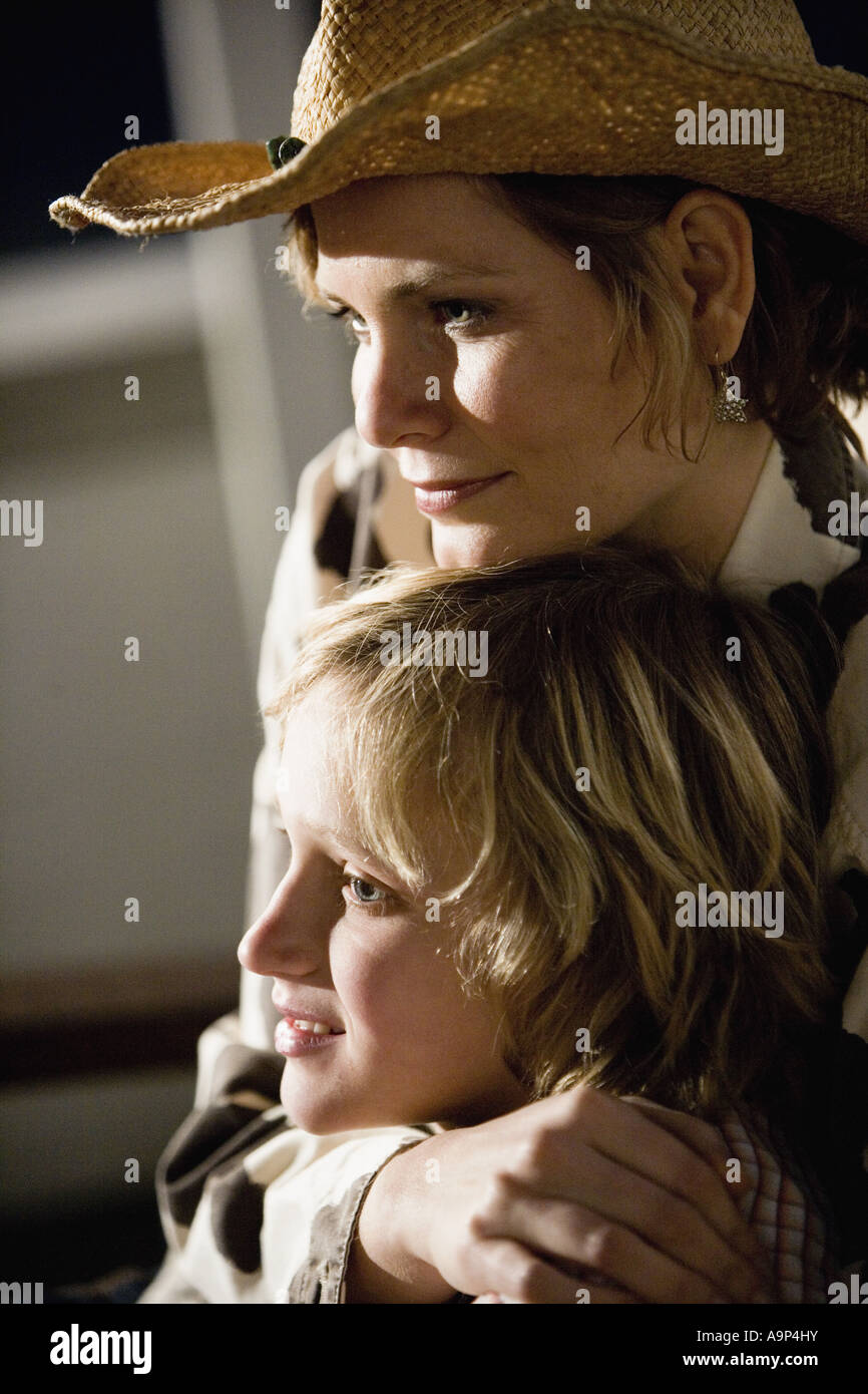 Country mother embracing son Stock Photo - Alamy