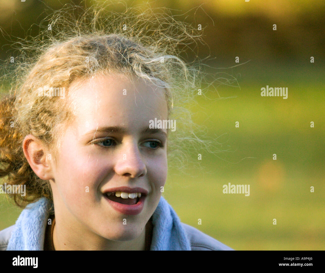Portrait of girl talking Stock Photo - Alamy