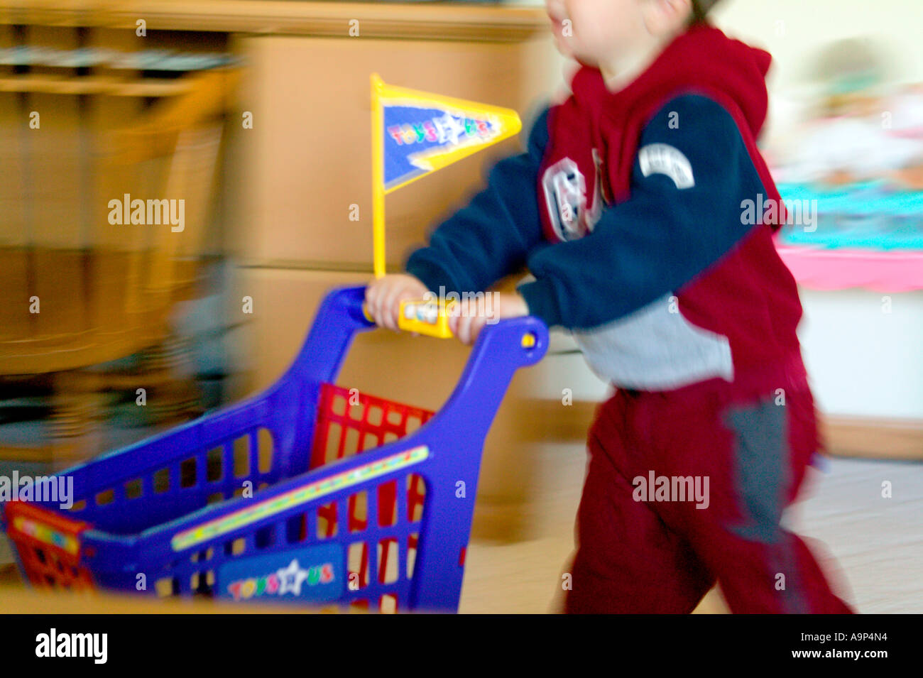 Boys pushing cart hi-res stock photography and images - Alamy