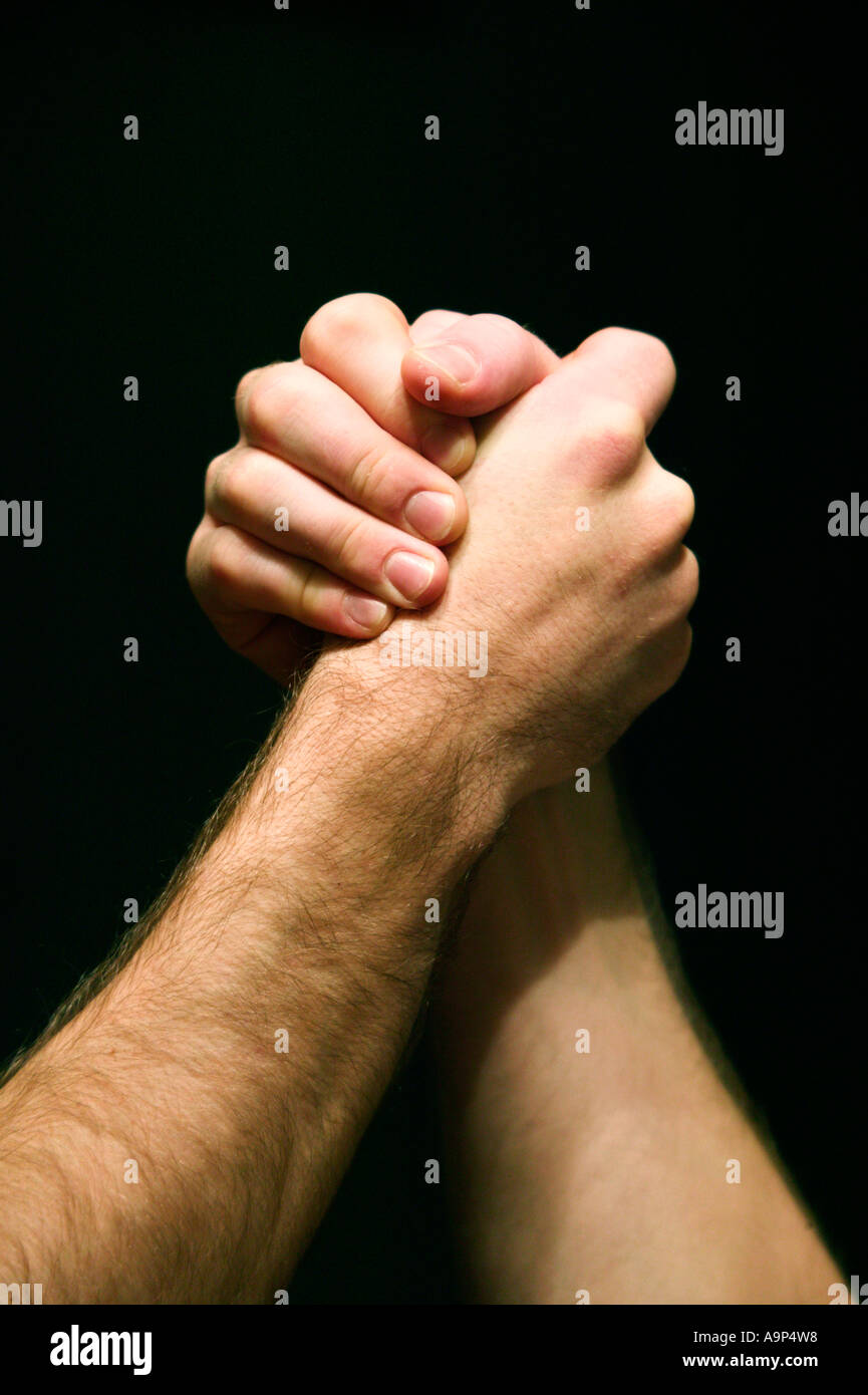 Men clasp hands hi-res stock photography and images - Alamy