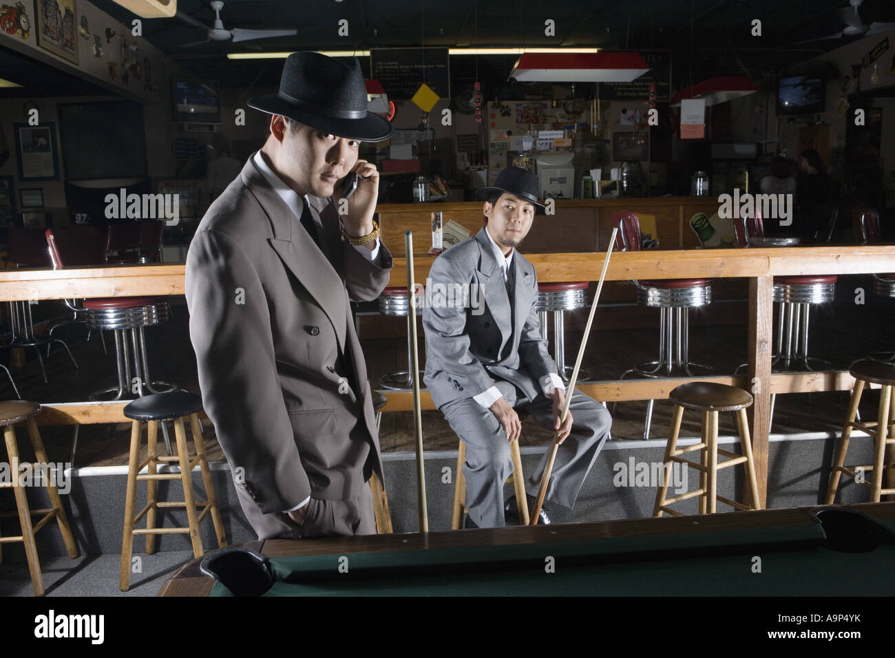 Gangsters in a pool hall Stock Photo - Alamy