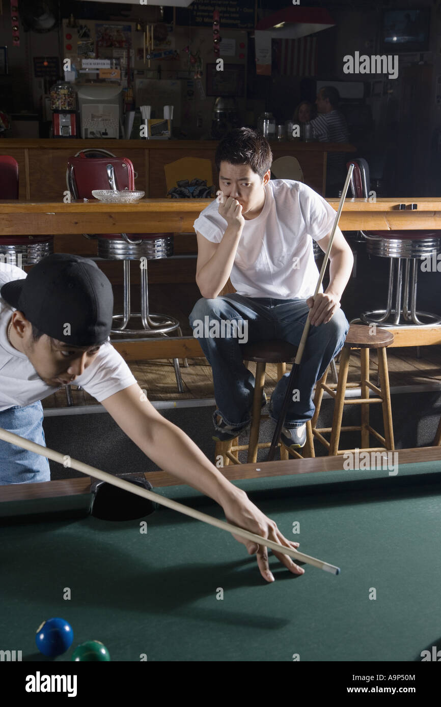 Boys playing billiards hi-res stock photography and images - Alamy