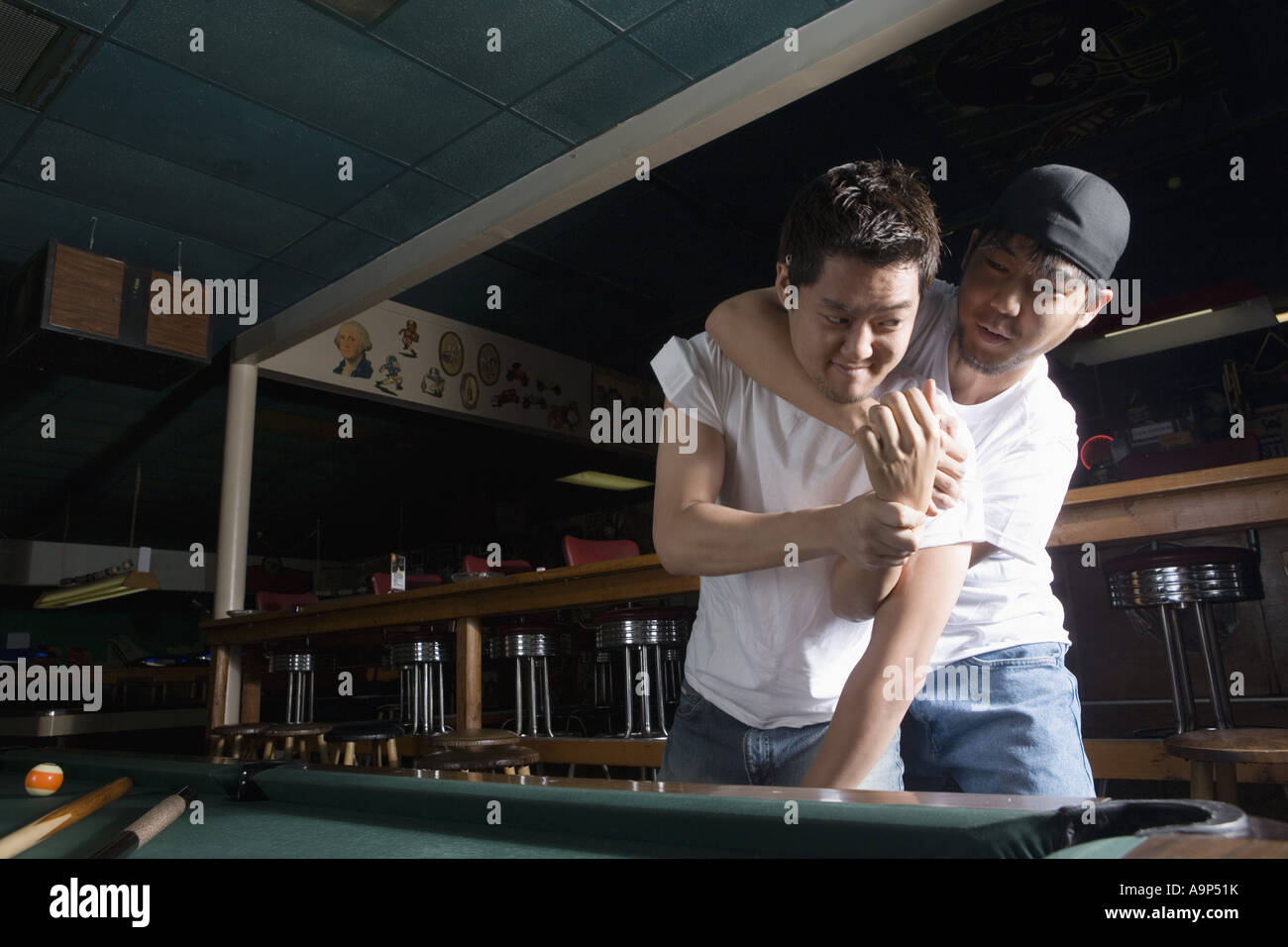 Gang members fight hi-res stock photography and images - Alamy