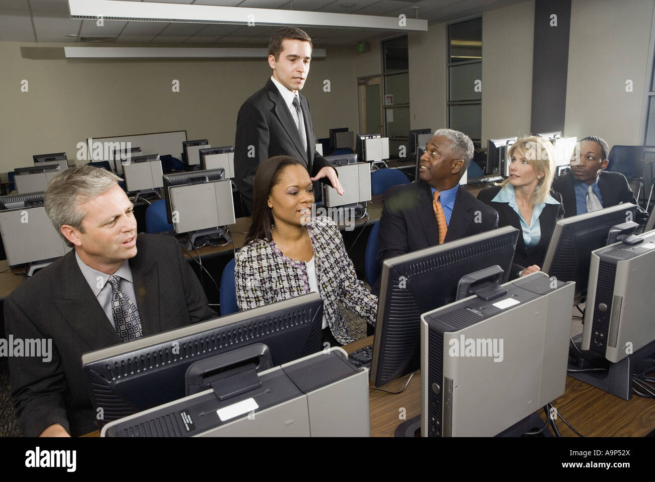 Business colleagues at a computer training seminar Stock Photo - Alamy