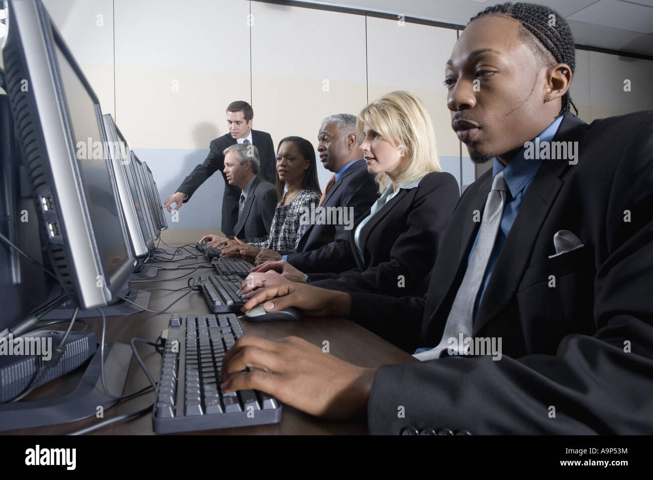 Business colleagues at a computer training seminar Stock Photo - Alamy