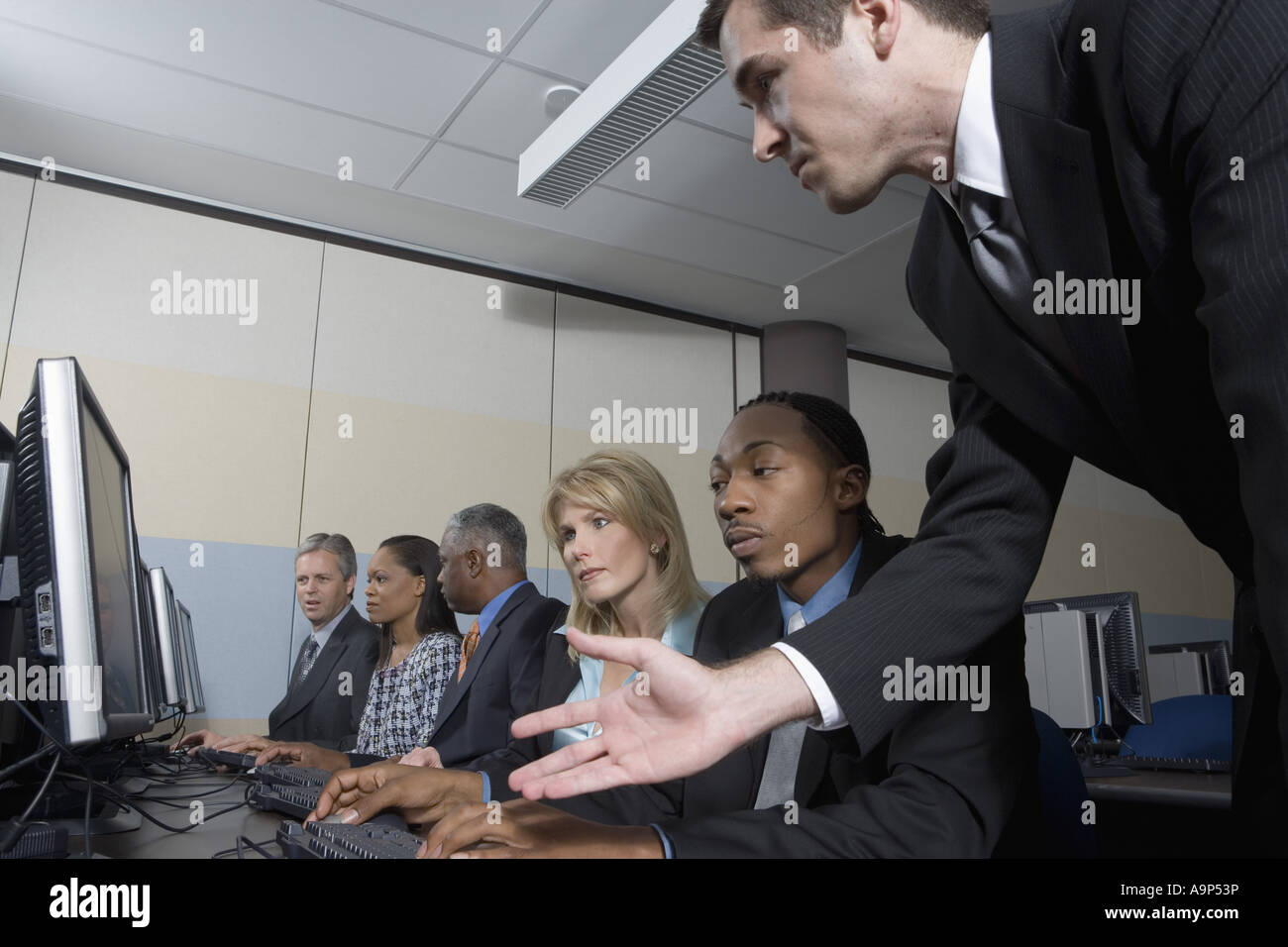 Business colleagues at a computer training seminar Stock Photo - Alamy