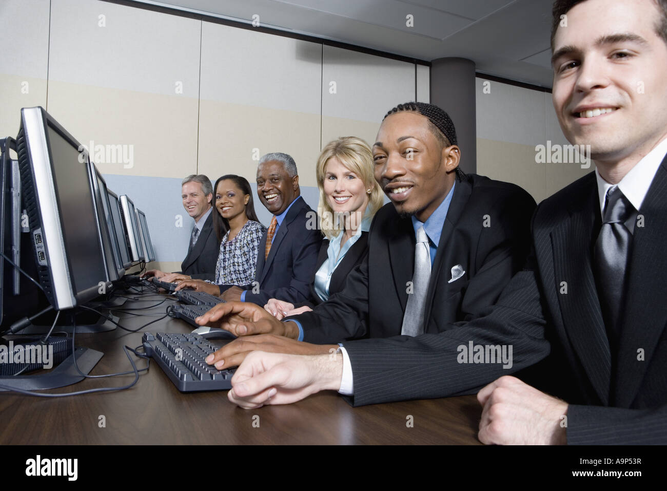 Business colleagues at a computer training seminar Stock Photo - Alamy