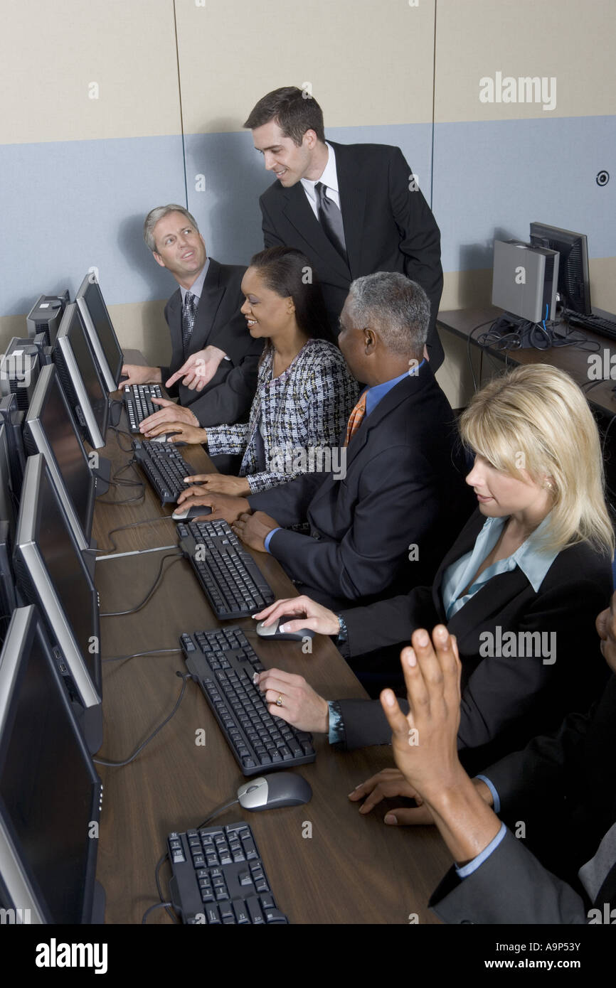 Business colleagues at a computer training seminar Stock Photo - Alamy