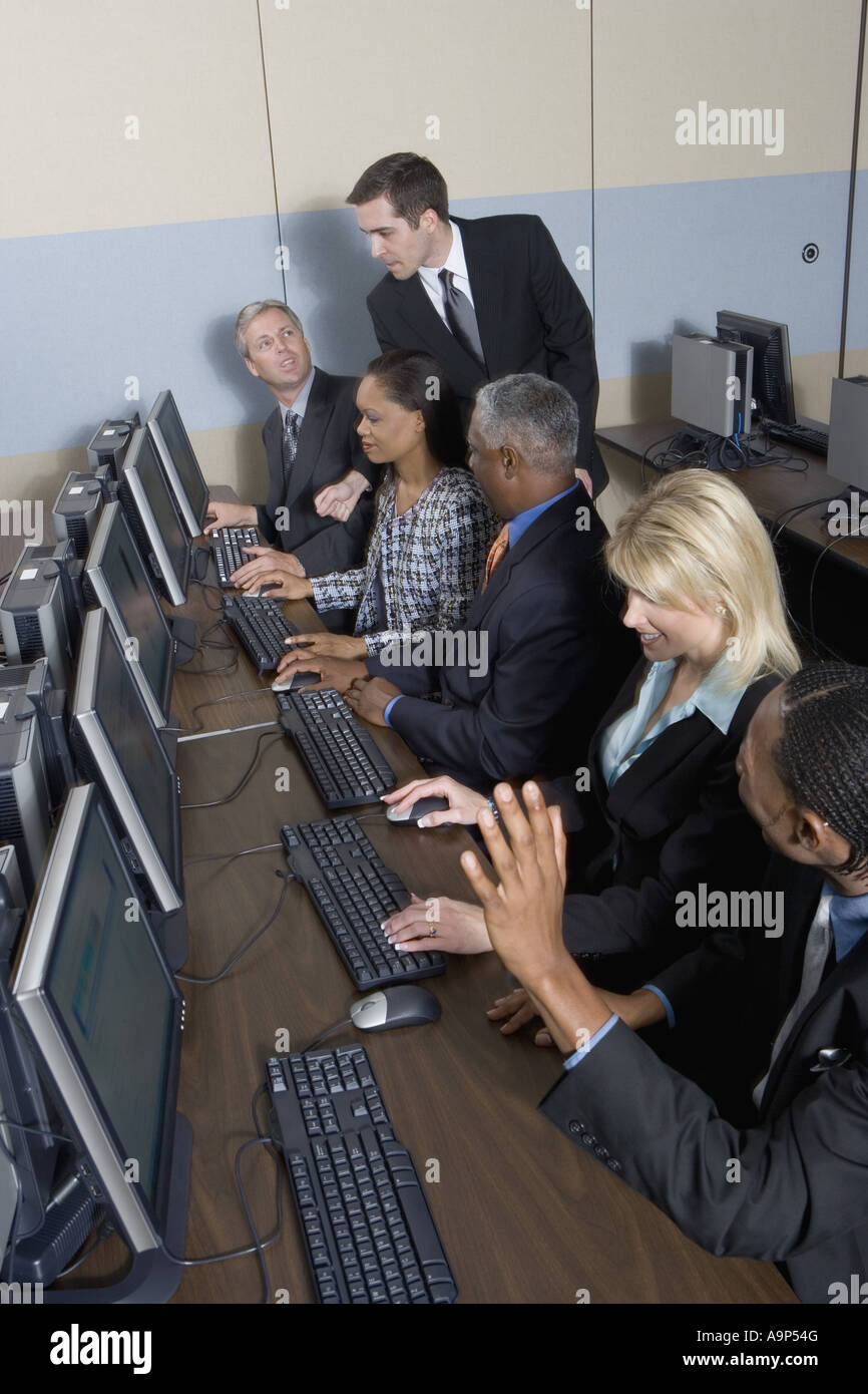 Business colleagues at a computer training seminar Stock Photo - Alamy