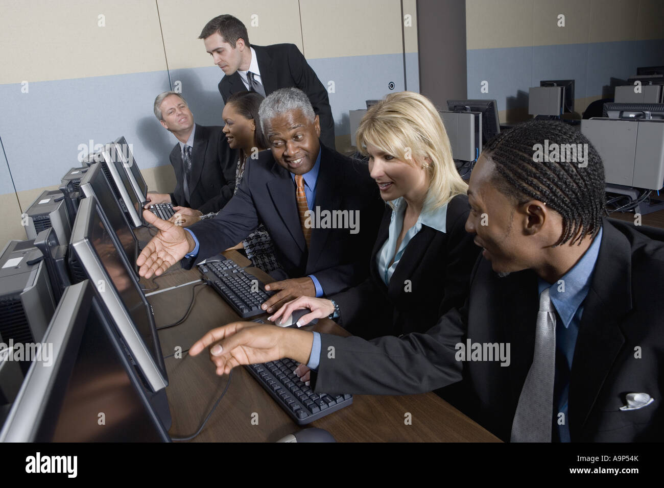 Business colleagues at a computer training seminar Stock Photo - Alamy