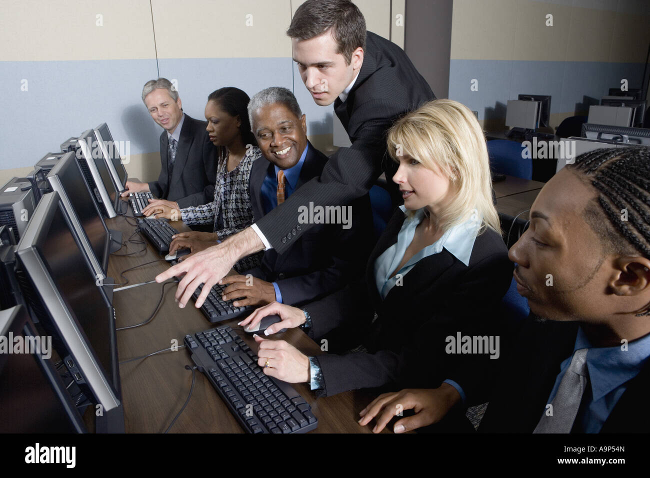Business colleagues at a computer training seminar Stock Photo - Alamy