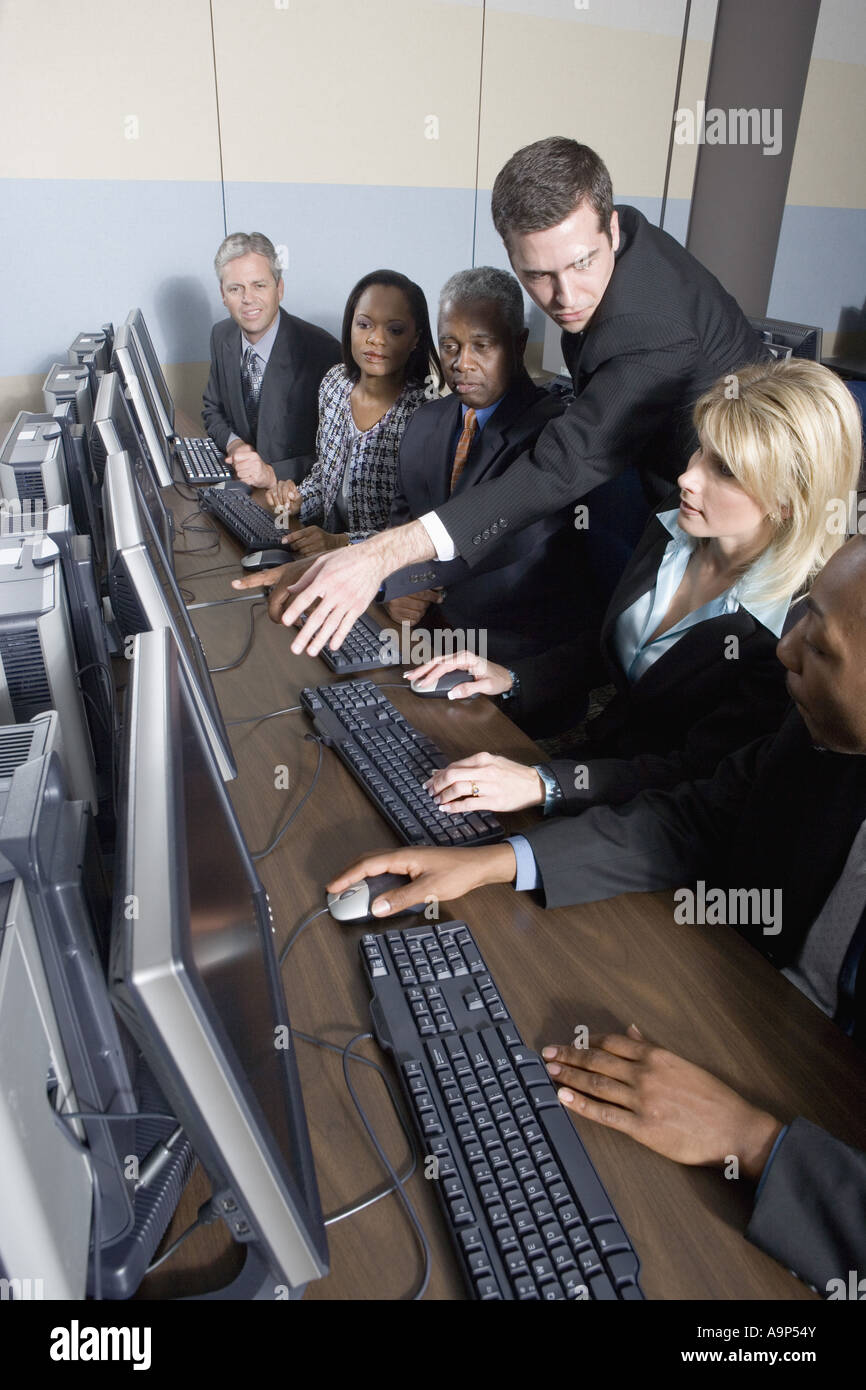 Business colleagues at a computer training seminar Stock Photo - Alamy
