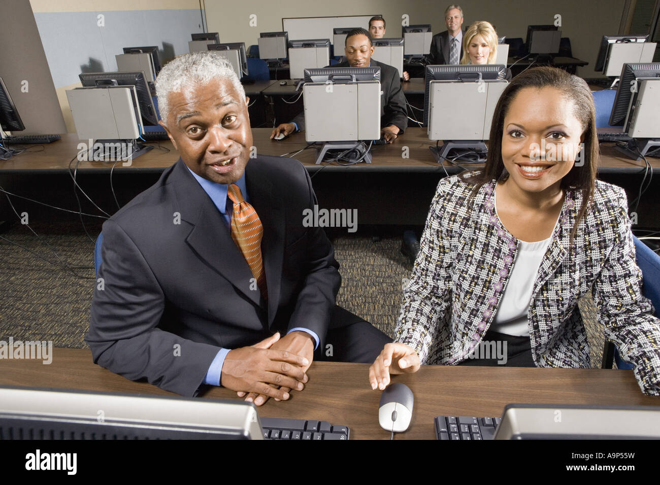 Business colleagues at a computer training seminar Stock Photo - Alamy