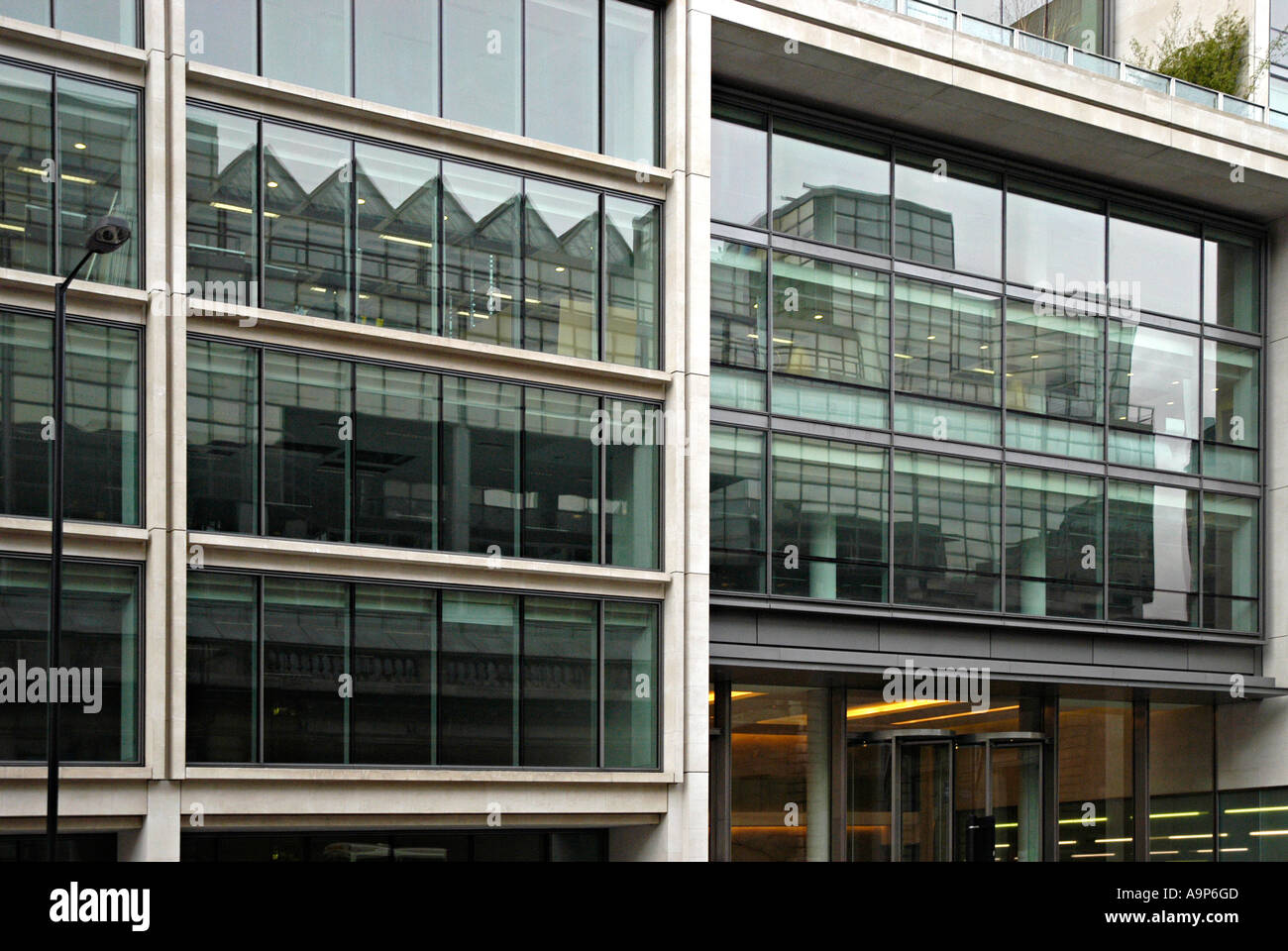Glass windows and walls of a city office block Stock Photo - Alamy