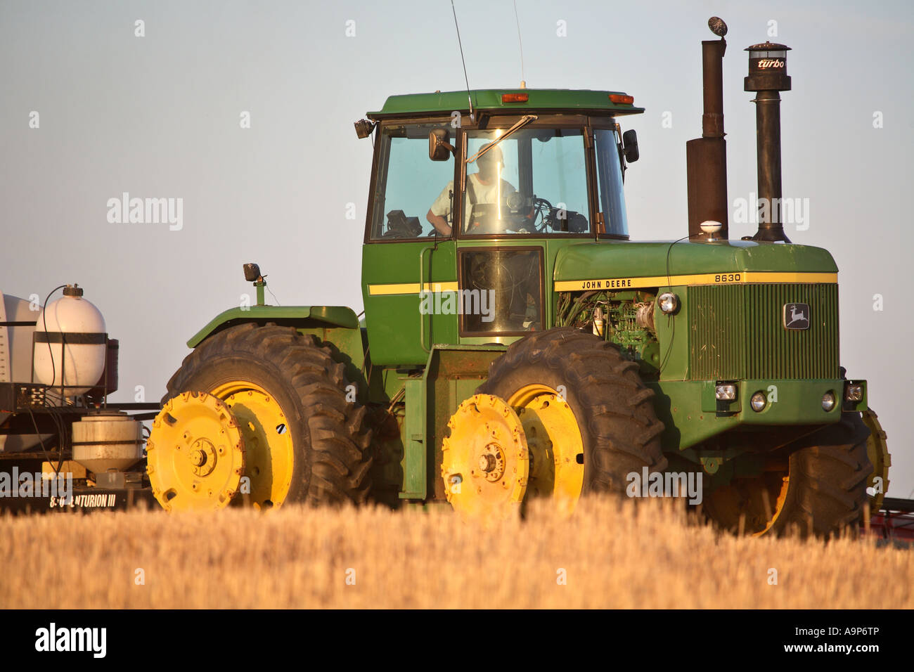 Farmer busy with spring seeding in Saskatchewan Stock Photo - Alamy