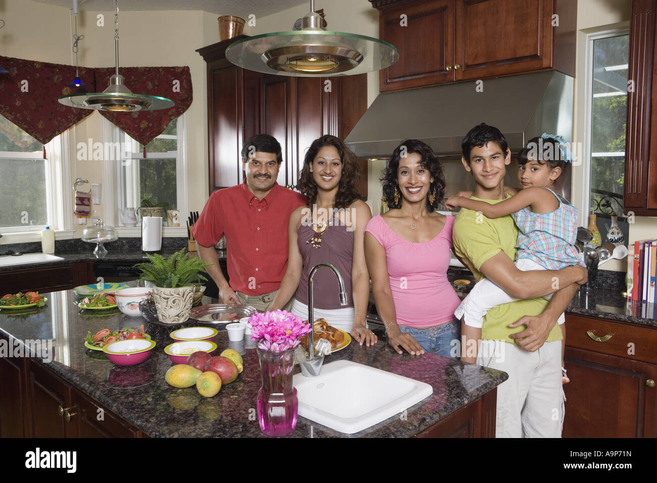 Portrait of extended Indian family in kitchen Stock Photo - Alamy