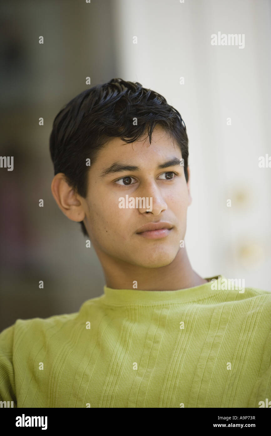 Indian boy thinking outdoors hi-res stock photography and images - Alamy
