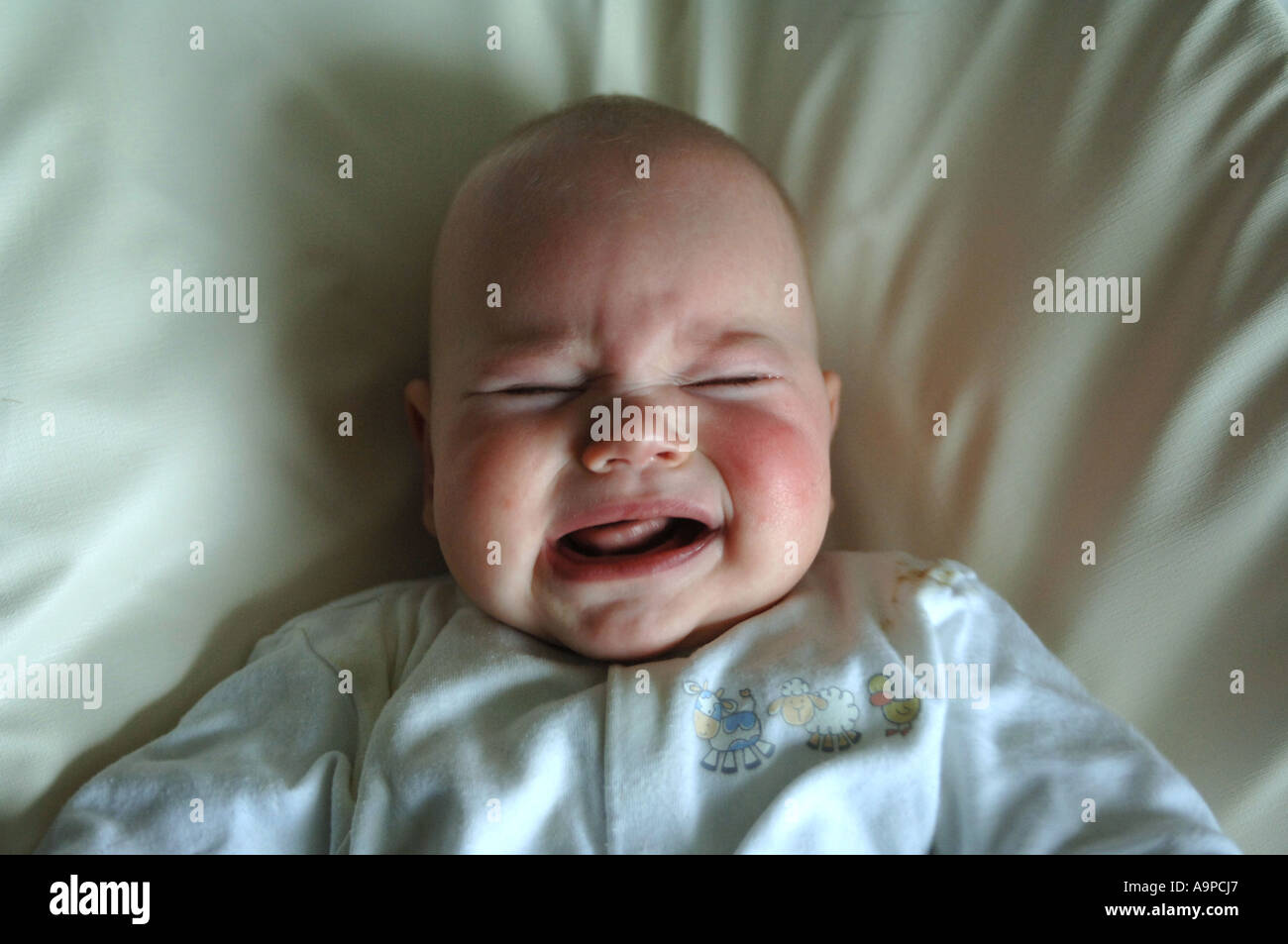 Screaming baby cot hi-res stock photography and images - Alamy