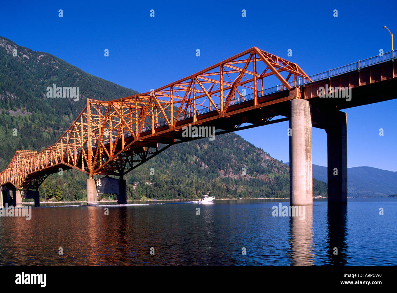 The Nelson Bridge (Orange Bridge) crossing over Kootenay Lake in Nelson ...
