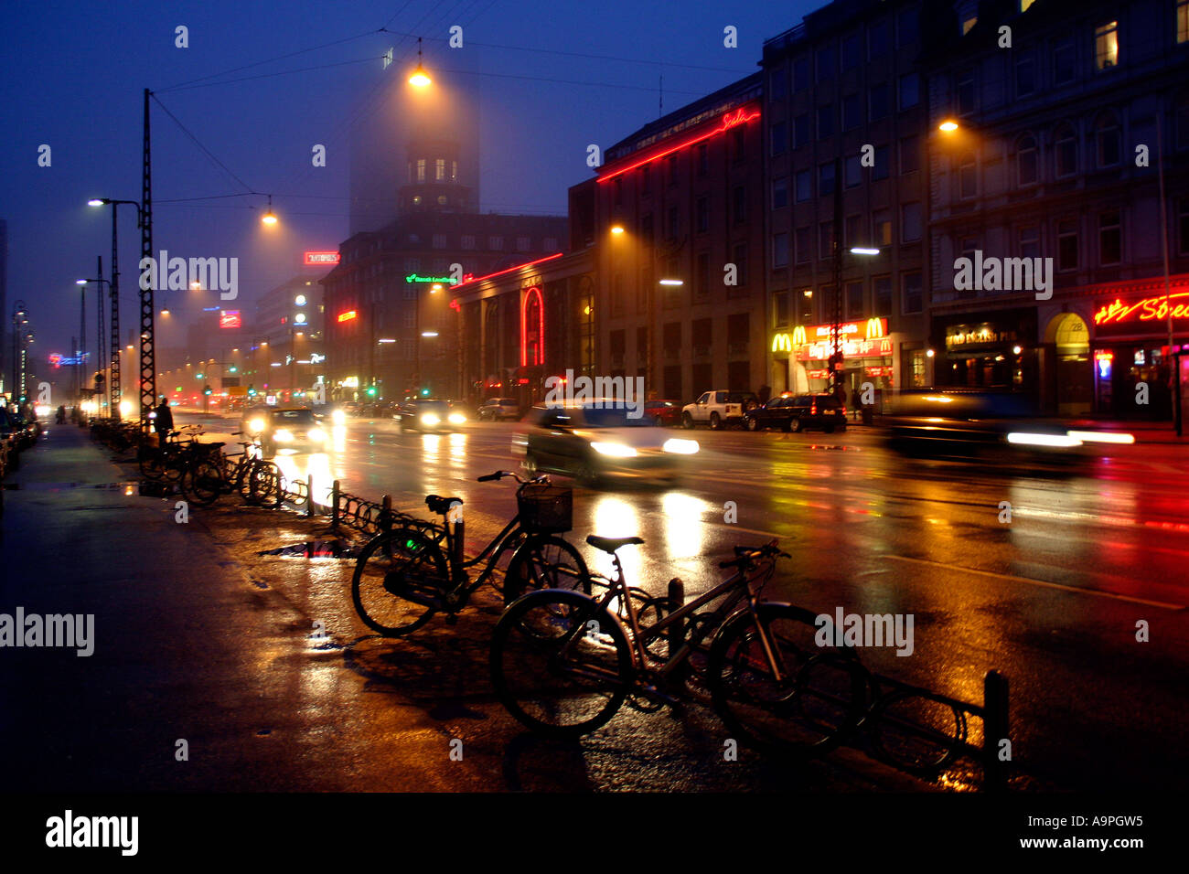 A night street scene in the city of Copenhagen Denmark Stock Photo - Alamy