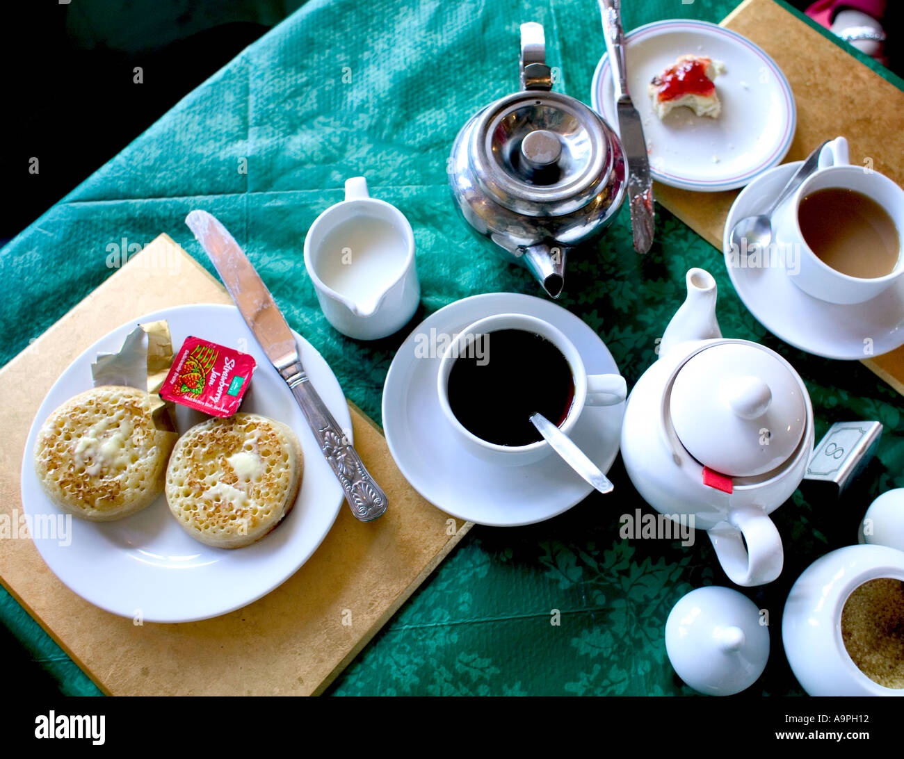Traditional English afternoon tea service, china, pot, cup, turbinado ...
