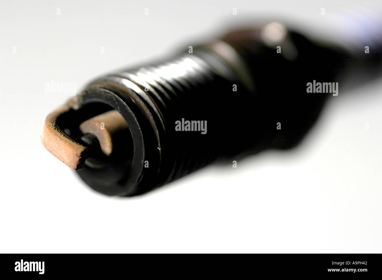 spark plug close up against white background Stock Photo - Alamy