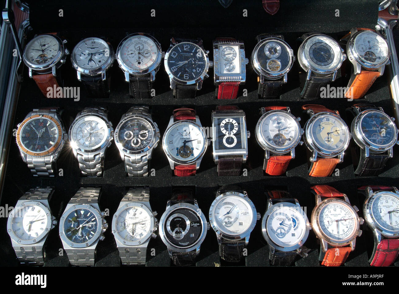 Fake designer counterfeit wrist watch clock timepiece time horology ...