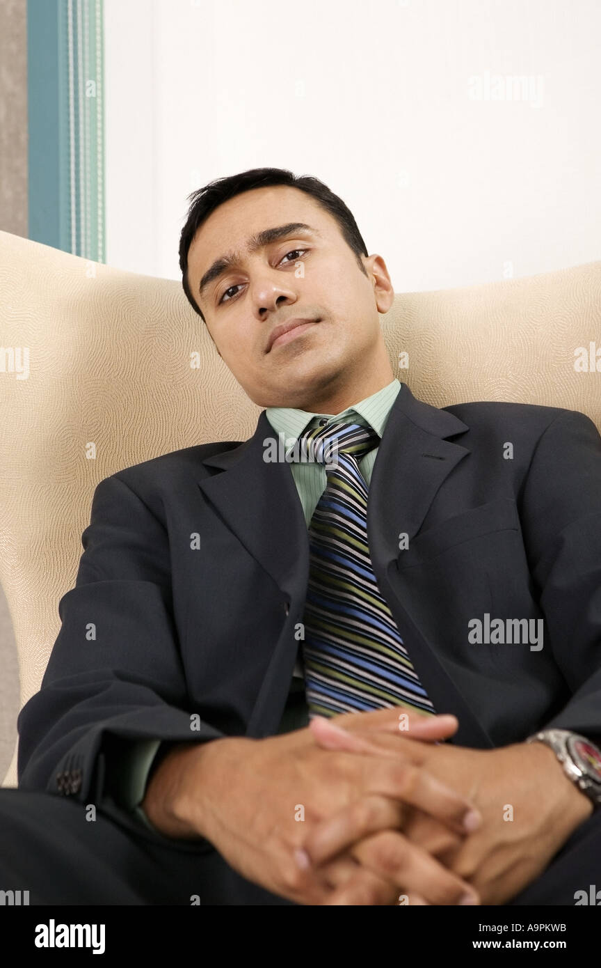 Slumped in chair hi-res stock photography and images - Alamy