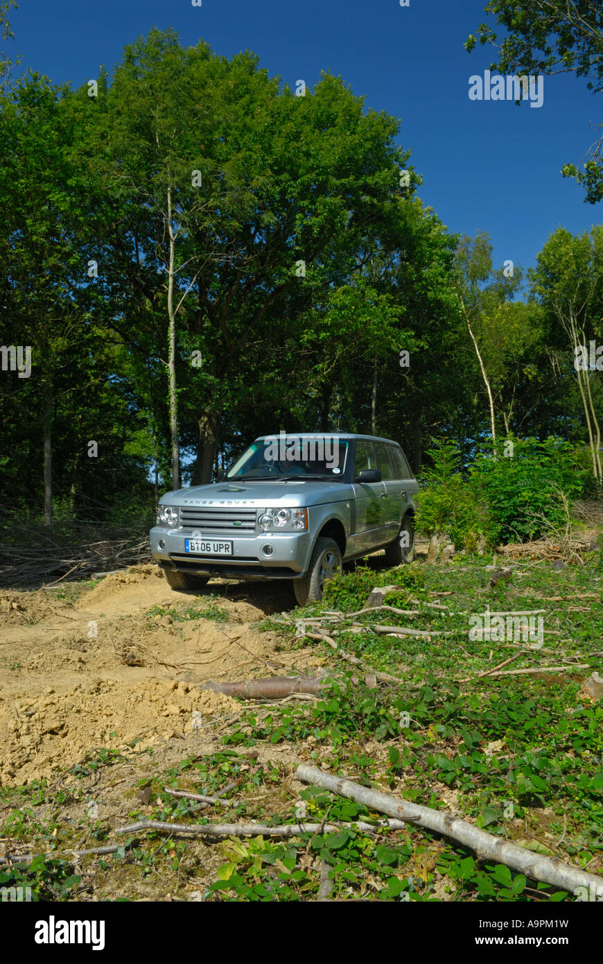 Off roading silver metallic Range Rover 3rd generation by Land Rover ...
