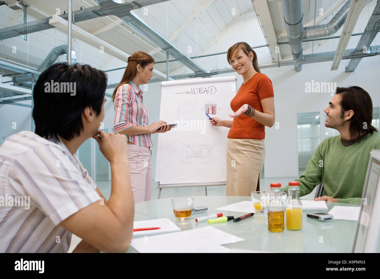 Woman giving presentation Stock Photo - Alamy