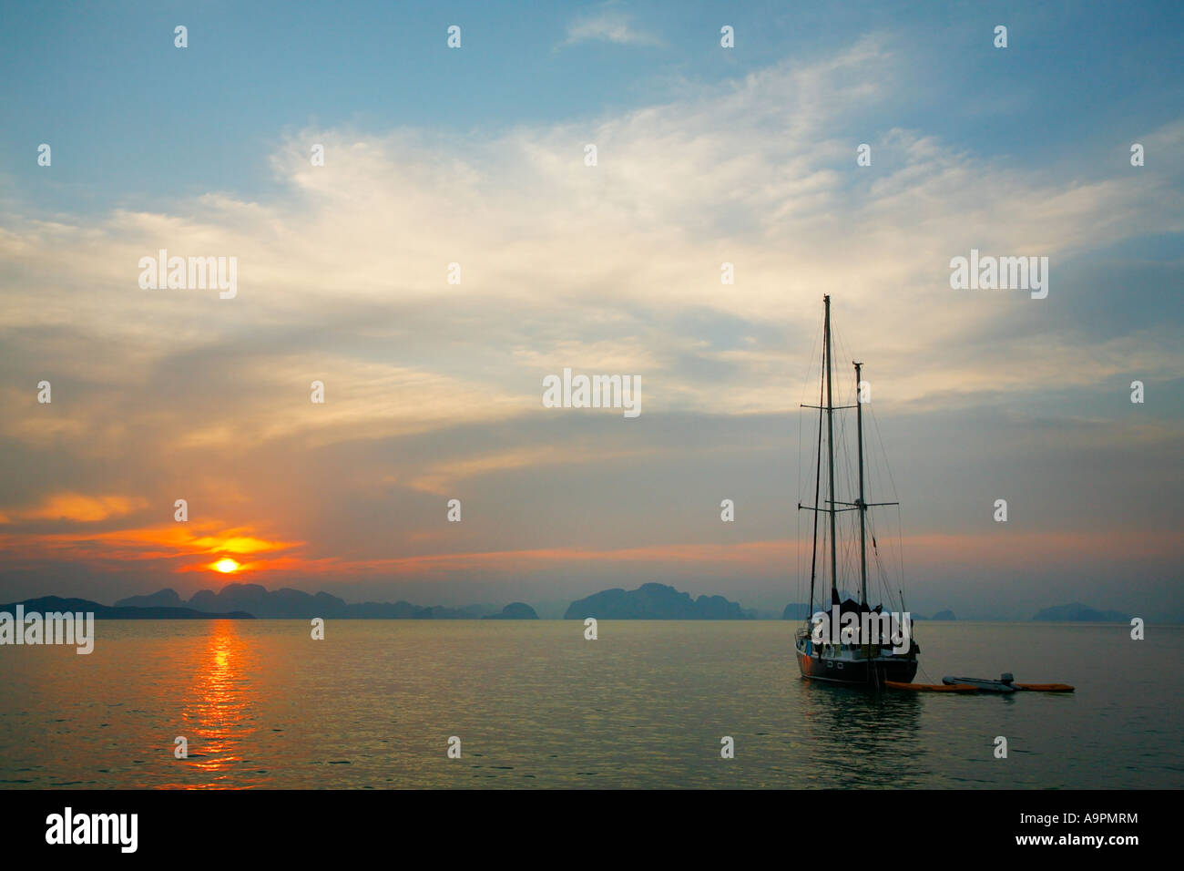 Sunset and sailboat, Andaman Sea near Koh (Ko) Phi Phi Leh (Lai), Thailand Stock Photo - Alamy