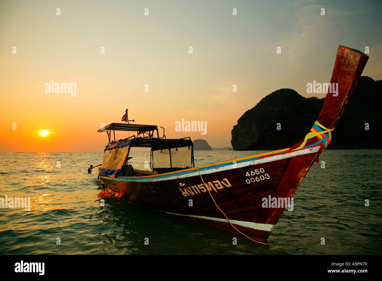 Sunset and local boat, Ko (Koh) Muk (Mook), Andaman Sea, Thailand Stock ...