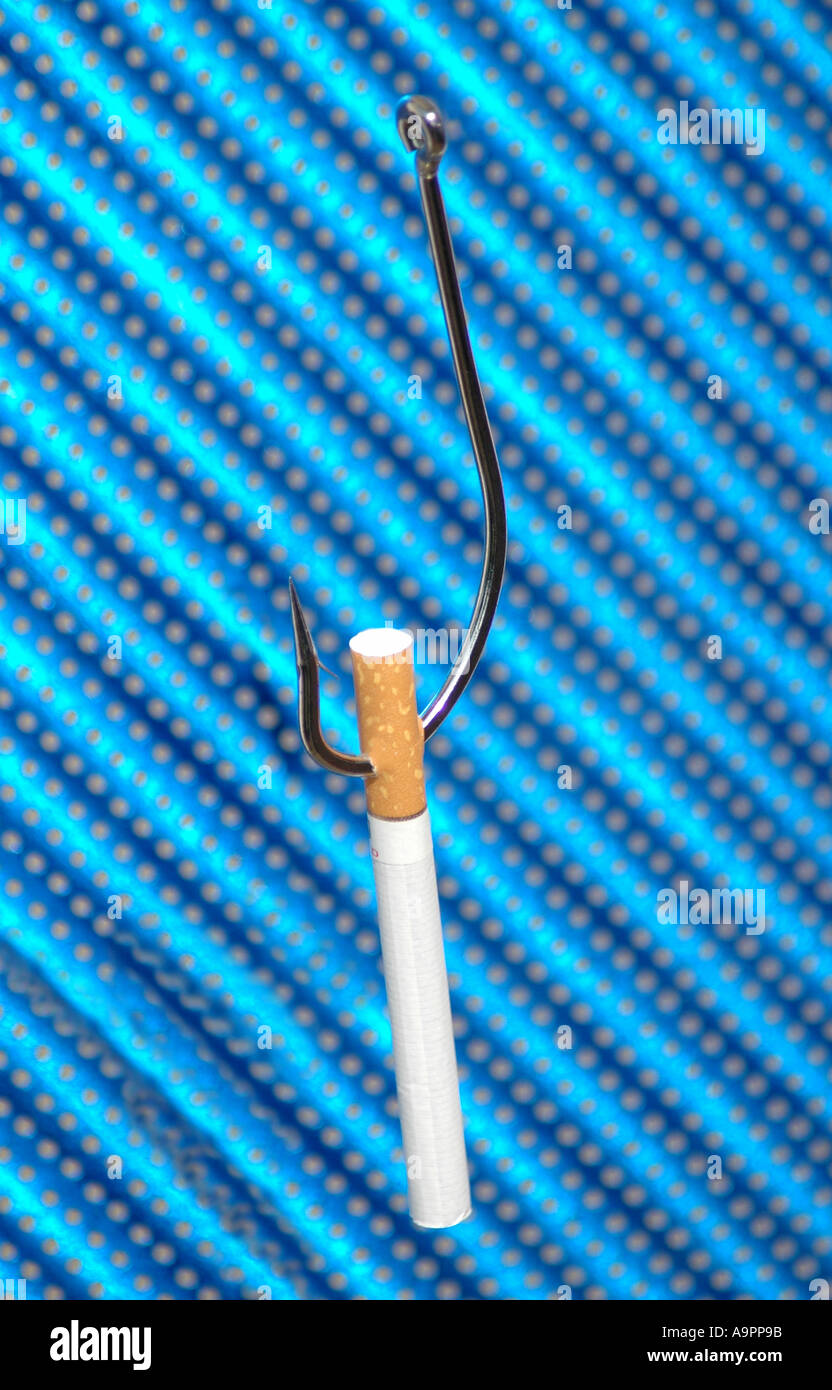 A metaphorical depiction of addiction to smoking tobacco Stock Photo ...