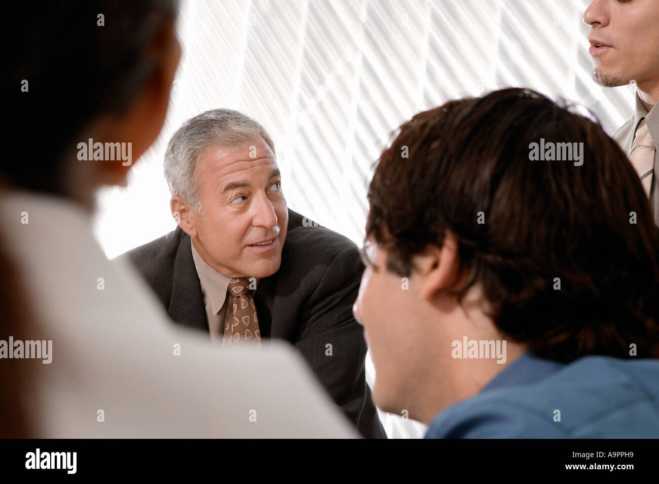 Men debating hi-res stock photography and images - Alamy
