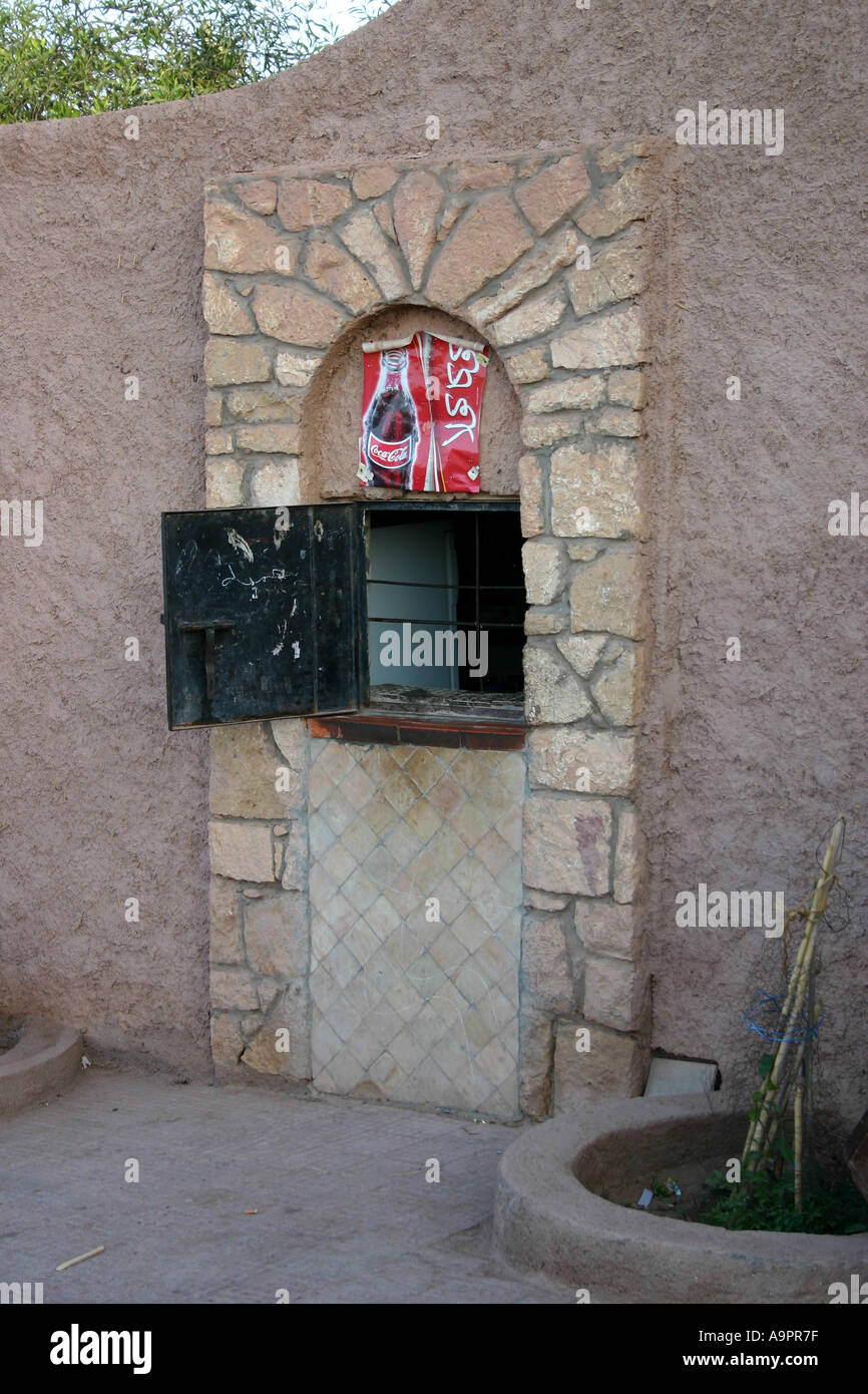 open oven pizza bread coke signage Morocco Marrakesh stone wall iron ...