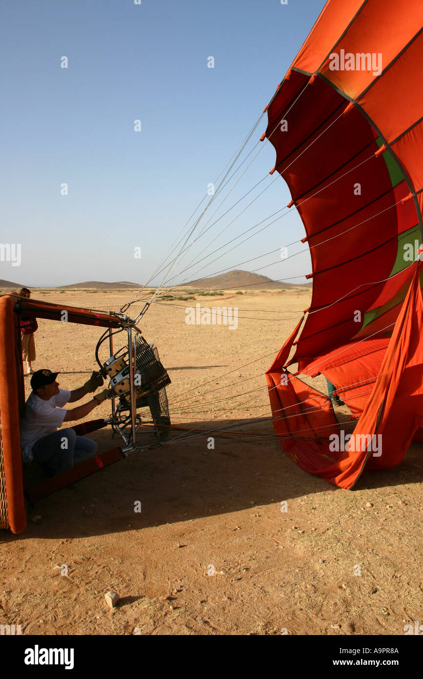 Filling Hot Air Balloon with air - side view Stock Photo - Alamy