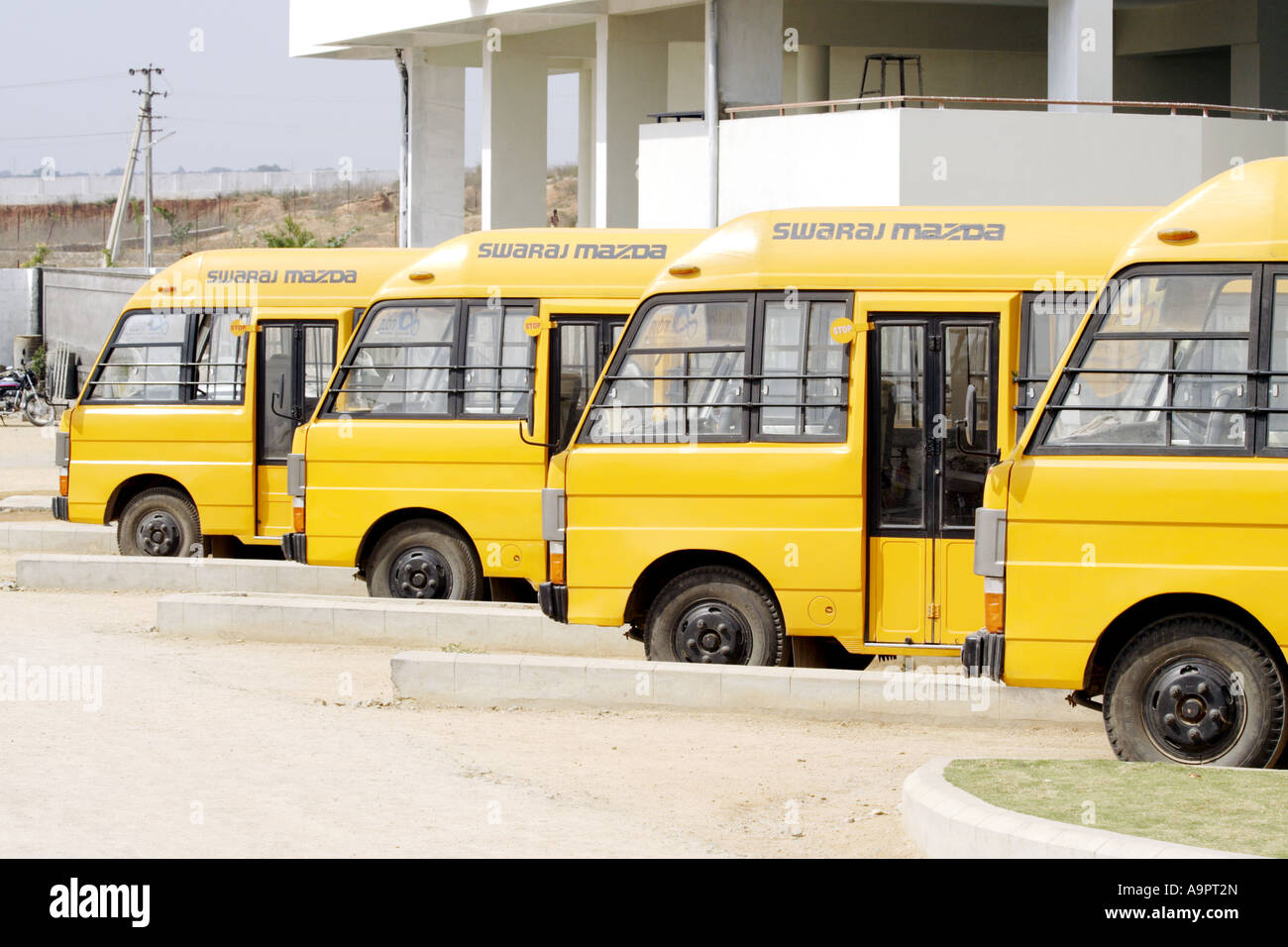 Buses in a bus stand Stock Photo - Alamy