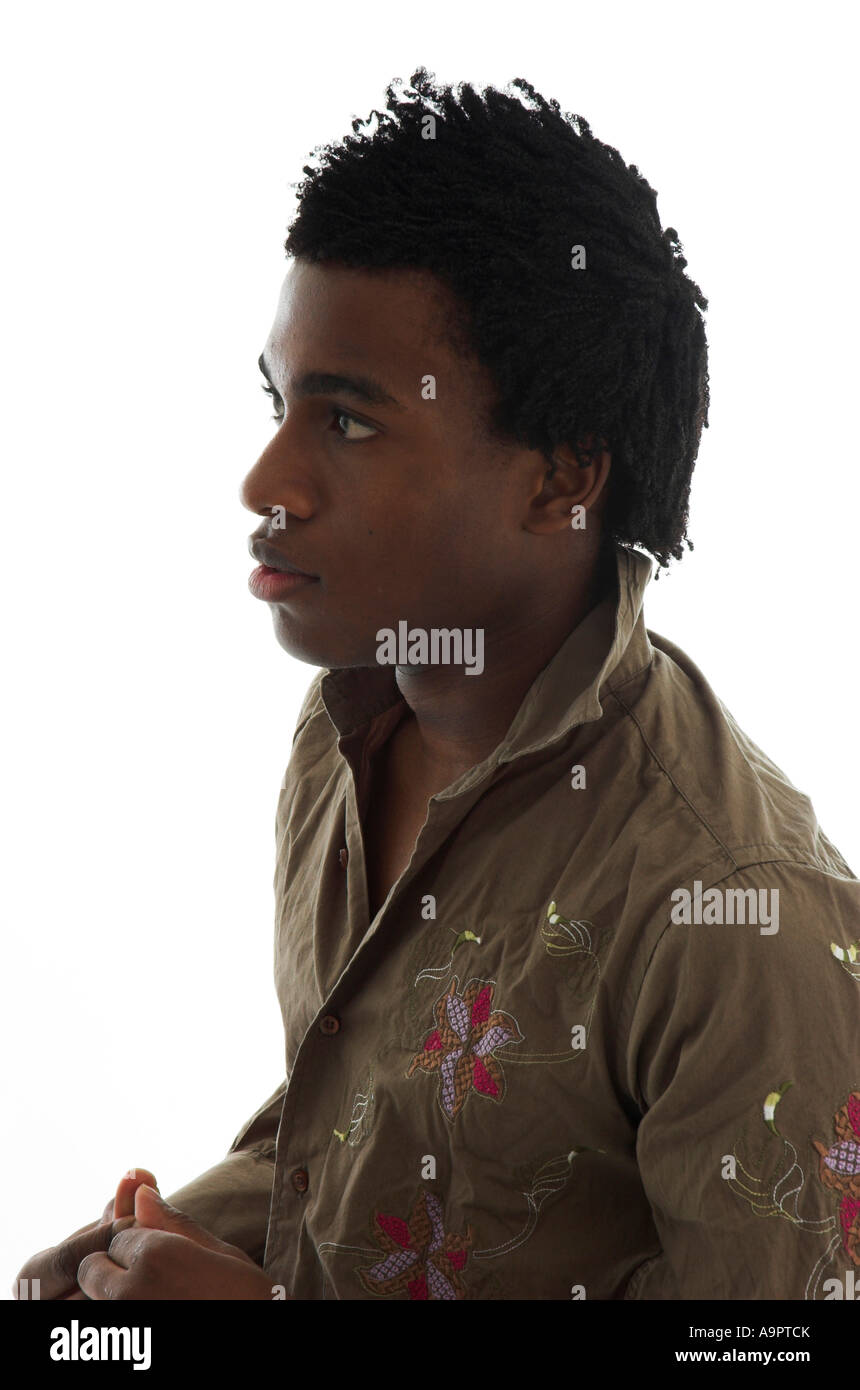 Studio shot of attractive fashionable young black man in a pose ...