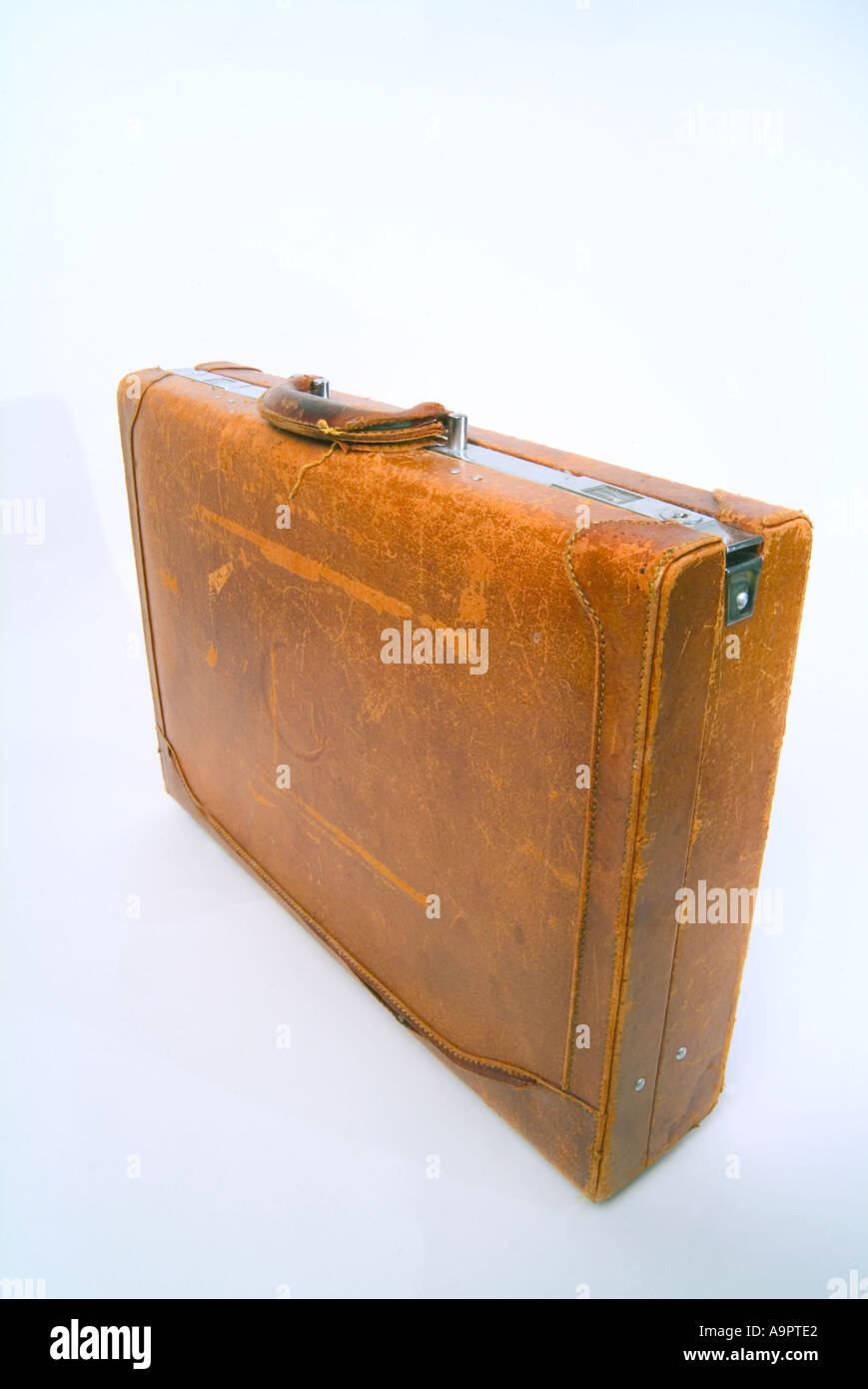 Battered old brown leather briefcase Stock Photo - Alamy