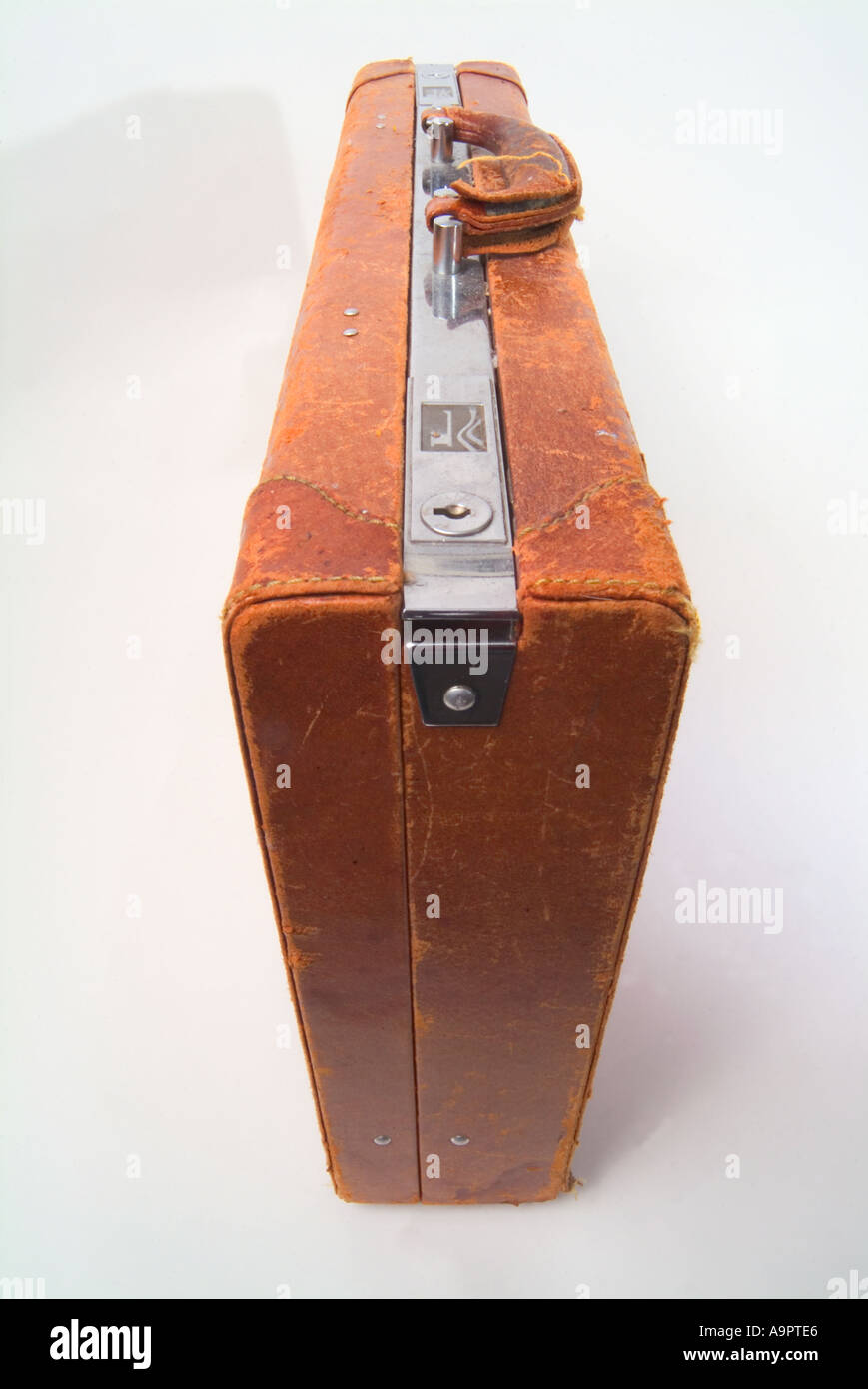 Battered old brown leather briefcase Stock Photo - Alamy