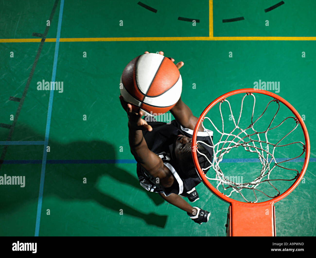 Basketball player scoring Stock Photo - Alamy Basketball player scoring Stock Photo - Alamy