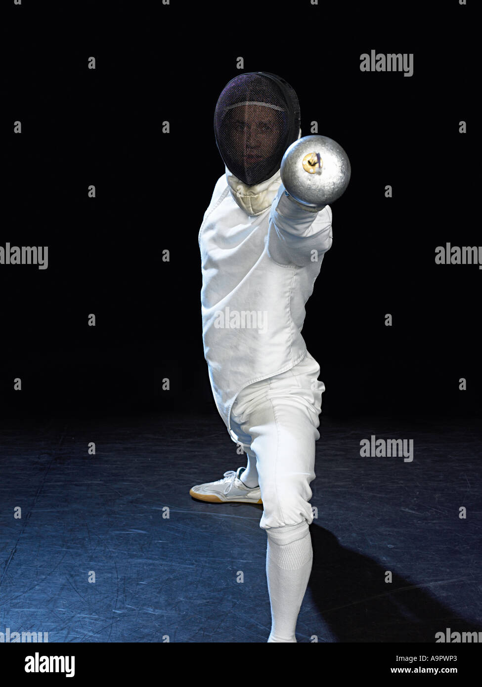 Male fencer holding fencing foil hi-res stock photography and images ...