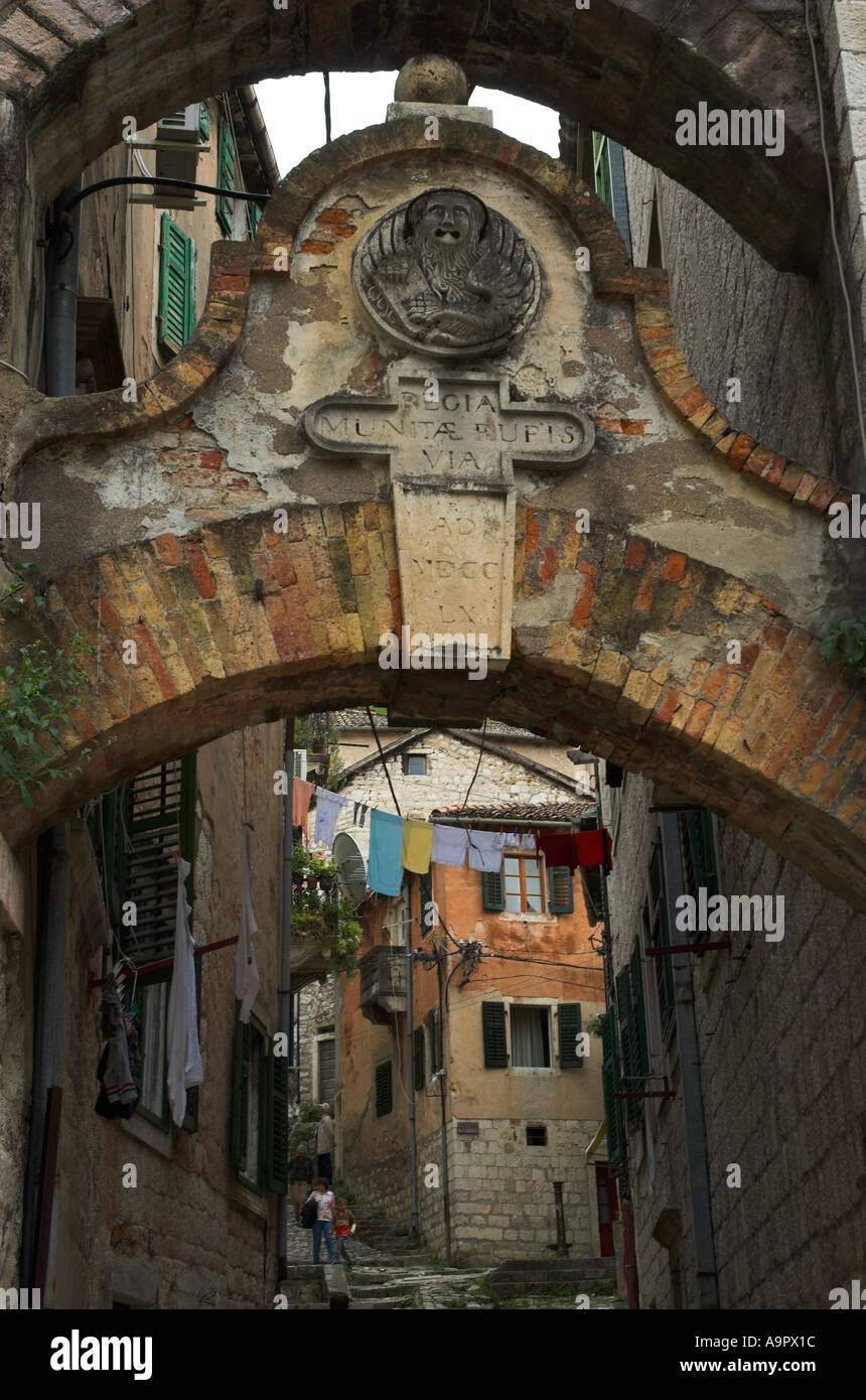 Montenegro Kotor Stari Grad Old Town street with decorated arch gate in ...