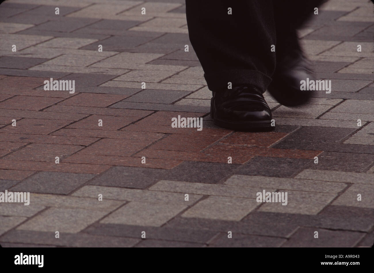 Feet of man crossing street in downtown seattle Stock Photo - Alamy