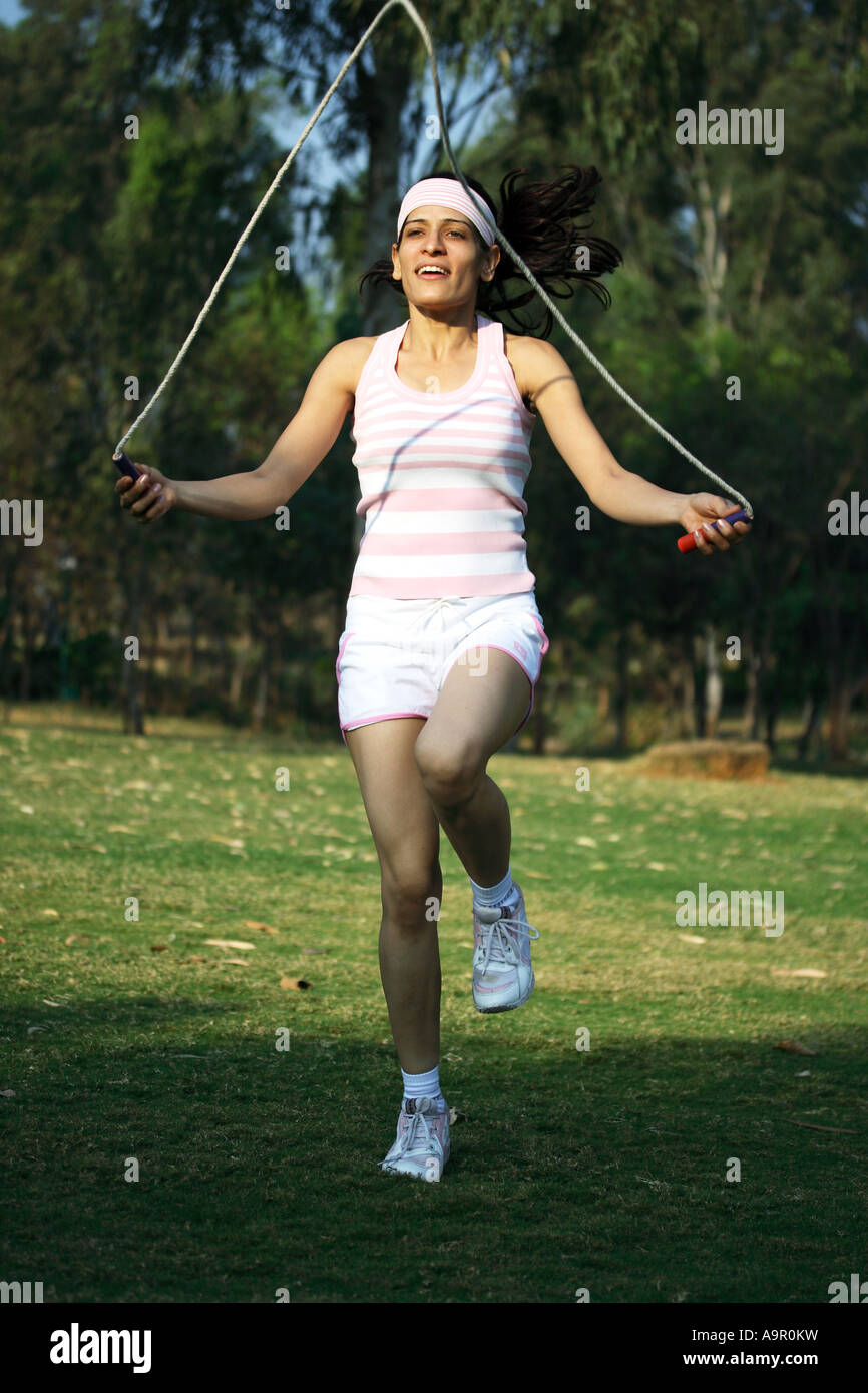 A woman skipping Stock Photo - Alamy