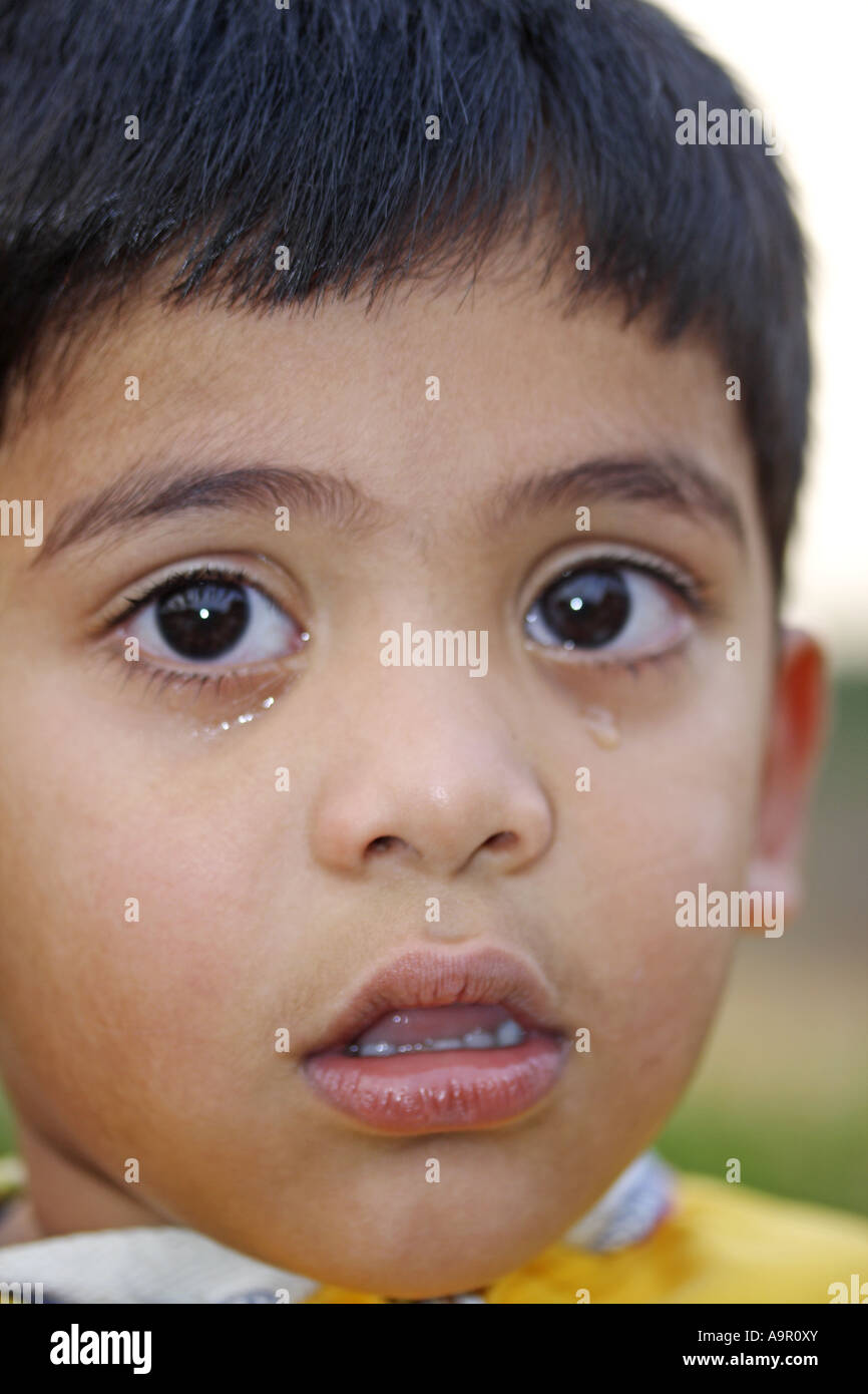 Close up of a young boy crying Stock Photo - Alamy