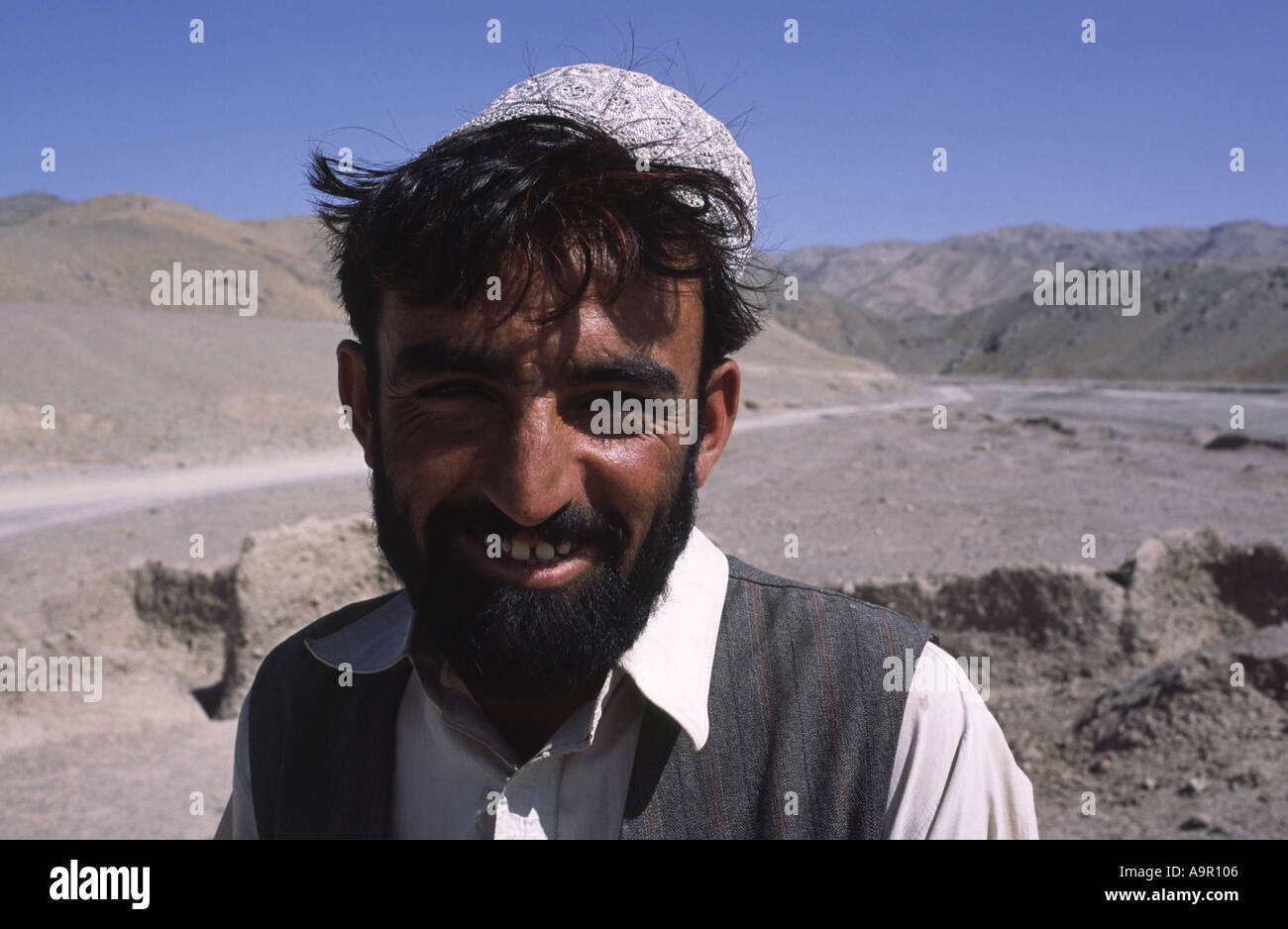 A young Pakistani man living in the remote arid and poor region of ...